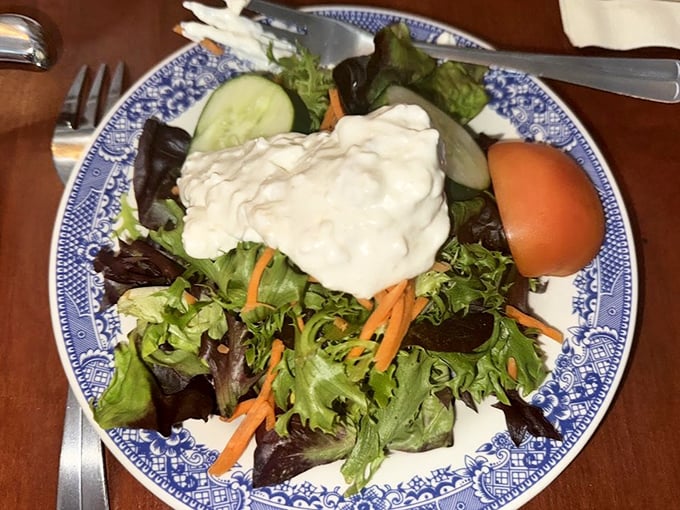 A garden of greens topped with creamy dressing—proof that even the founding fathers knew a meal wasn't complete without something fresh and crisp.