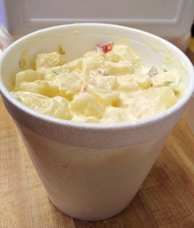 Even the potato salad gets the respect it deserves here—creamy, substantial, and the perfect cool counterpoint to smoky meat.