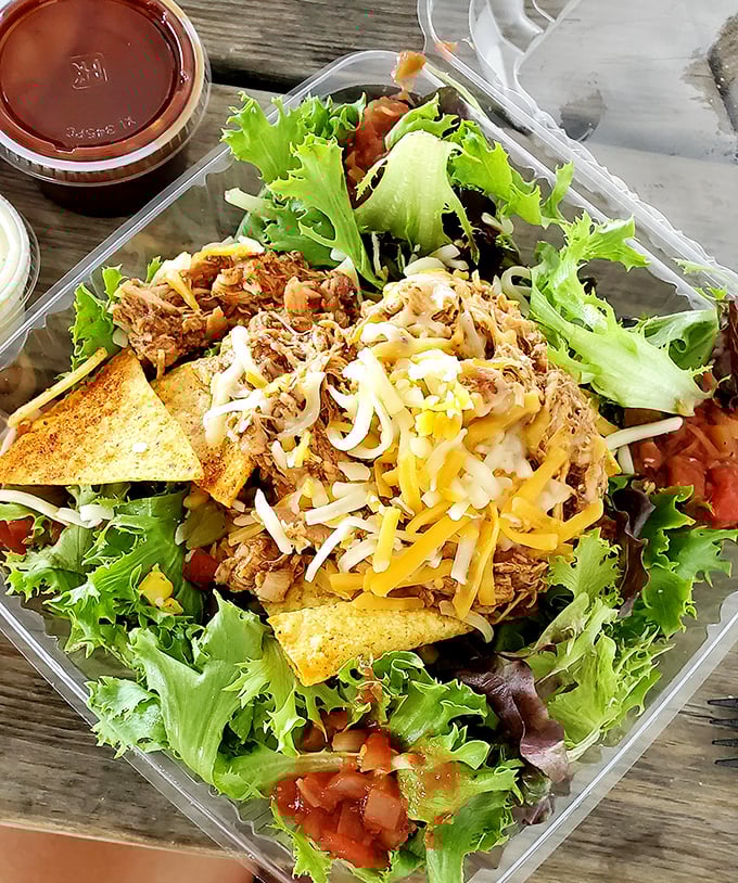 Even the salads get the barbecue treatment here—pulled pork and cheese turning ordinary greens into something extraordinary.