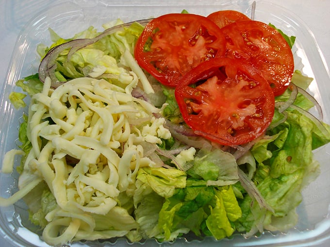 Even the salad looks like it's having a good time—fresh, vibrant, and ready to play the supporting role to your main event.