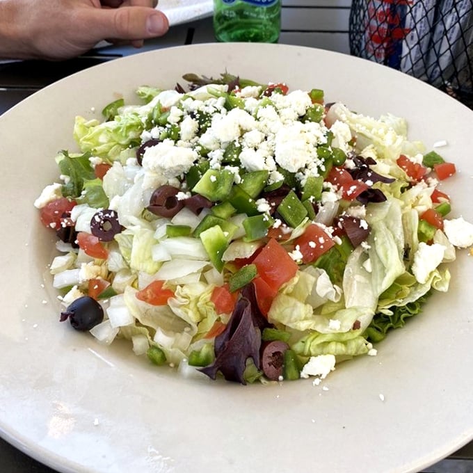 This isn't just a salad—it's a colorful convention of vegetables with feta cheese serving as the keynote speaker.