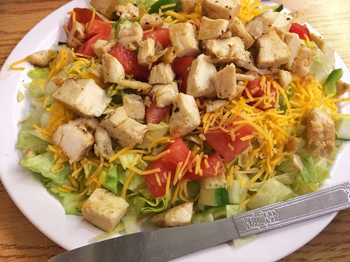 A salad that doesn't apologize for being delicious – grilled chicken and sharp cheddar proving healthy doesn't mean boring in North Carolina.