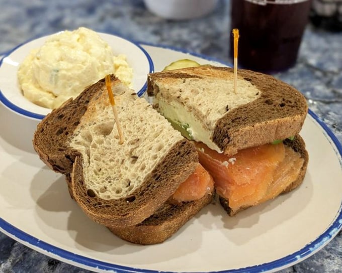 The salmon sandwich that launched a thousand return visits. That side of grits isn't just a side—it's a supporting actor worthy of its own award.