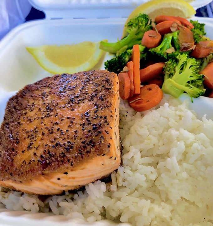 Grilled salmon that doesn't need a fancy sauce to sing—just rice, vegetables, and the confidence of perfectly cooked fish.