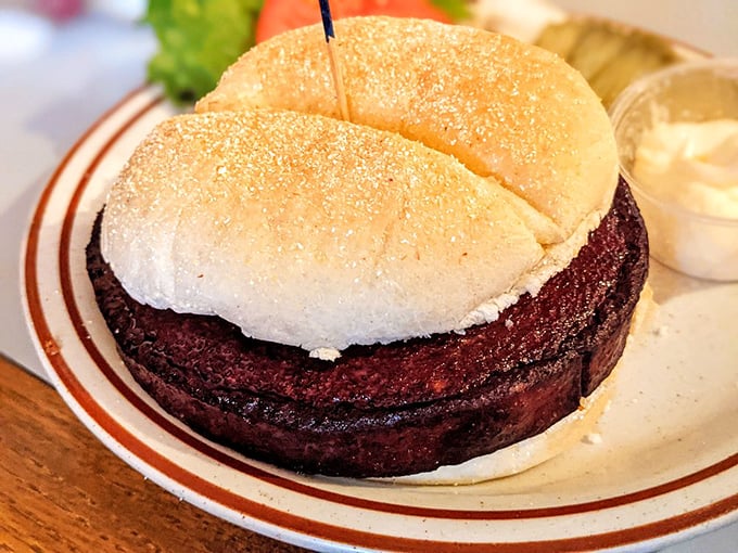 Simplicity that speaks volumes. This classic burger doesn't need fancy toppings or Instagram filters—just quality beef, proper cooking, and a soft bun to bring it all home.