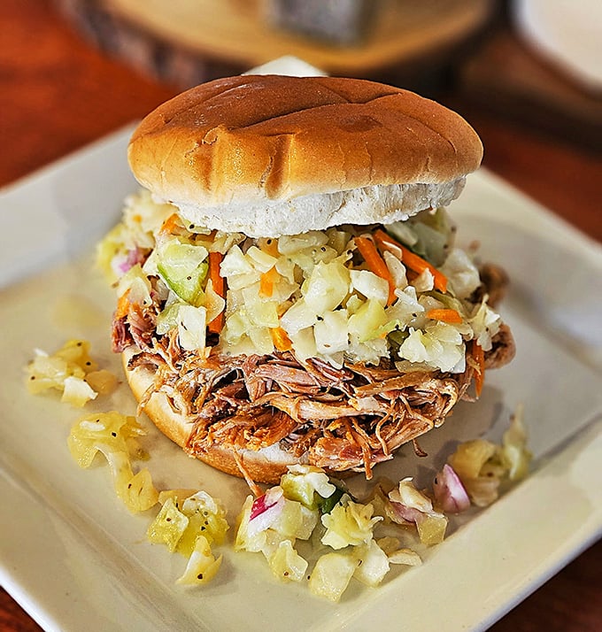 The ultimate pulled pork sandwich isn't just a meal—it's an engineering marvel. The slaw provides crucial structural support while adding refreshing crunch to each bite.