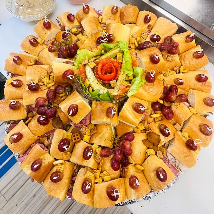 Party platter perfection! This circular celebration of mini-sandwiches proves good things come in small packages – lots and lots of them.