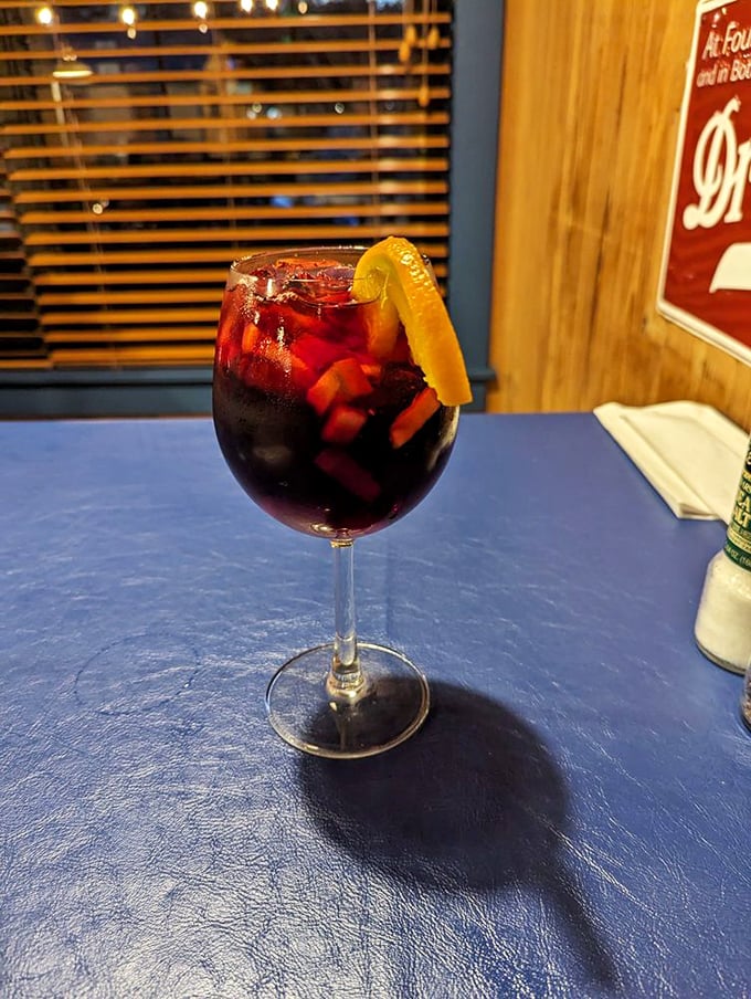 Not just any sangria—this ruby-red beauty, studded with fruit and served in a proper wine glass, is vacation in liquid form.