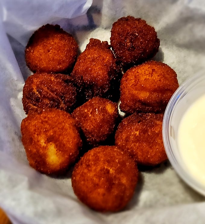 These golden-brown sauerkraut balls are Ohio's answer to arancini—crispy outside, savory inside, and completely addictive with that side of dipping sauce. 