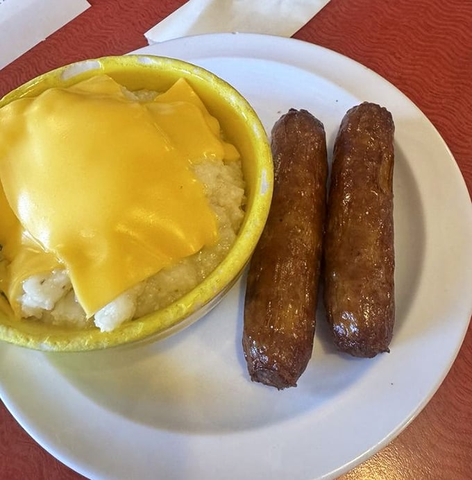 Sausage links with cheesy grits—a Southern classic that makes you wonder why anyone would ever settle for cold cereal.