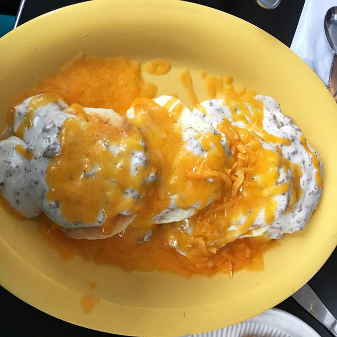 Biscuits swimming in a sea of sausage gravy—the breakfast equivalent of getting a warm hug from your grandmother who secretly knows how to make everything better.