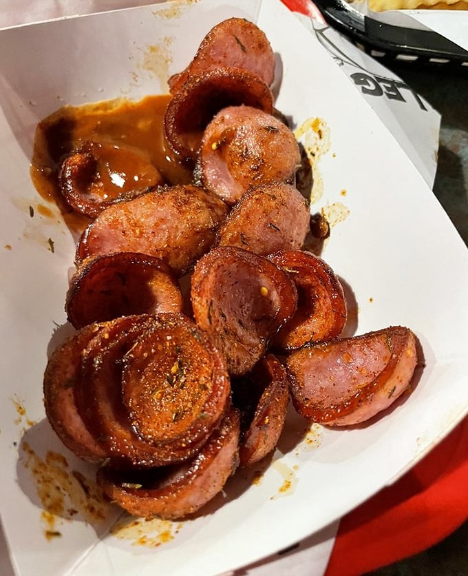 Smoked sausage slices glistening with sauce—proof that circles can indeed be the perfect shape for delivering happiness.