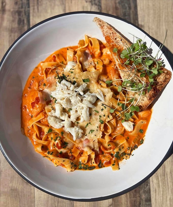 This seafood pasta isn't just a dish; it's a love letter written in tomato cream sauce, with chunks of seafood serving as passionate exclamation points. 