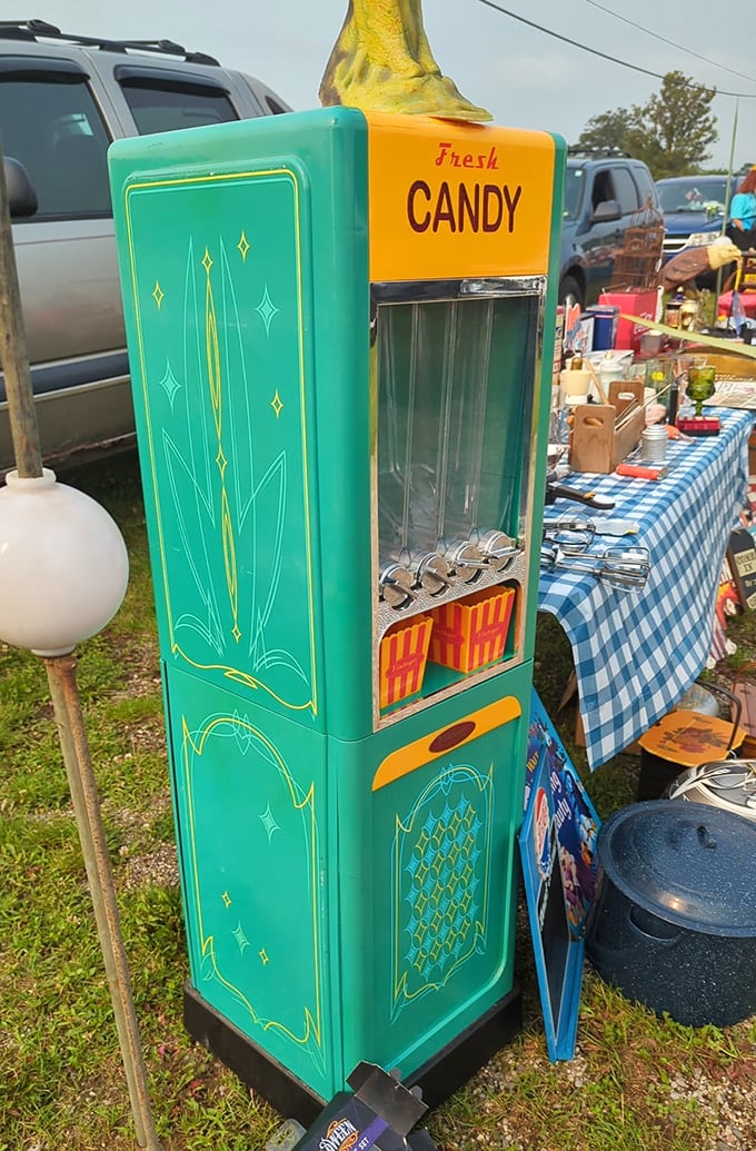 This retro candy dispenser isn't just selling sweets—it's dispensing pure nostalgia from an era when turquoise was the color of optimism.