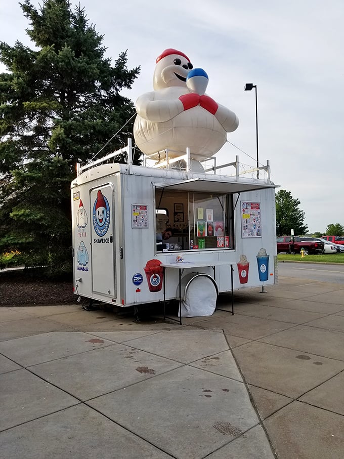 The shaved ice stand—where summer shopping expeditions pause for brain freeze therapy and sticky fingers.