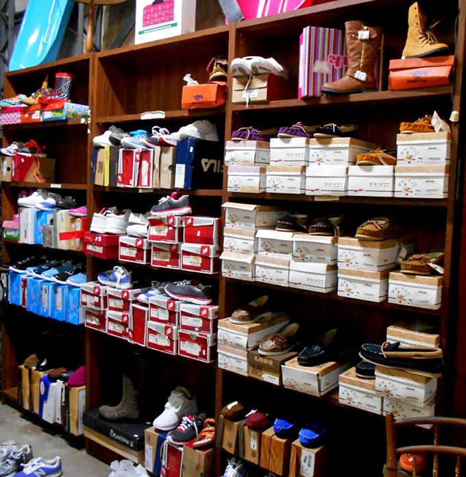 Not just shoes, but possibilities—rows of footwear organized with surprising precision in this otherwise delightfully chaotic emporium.
