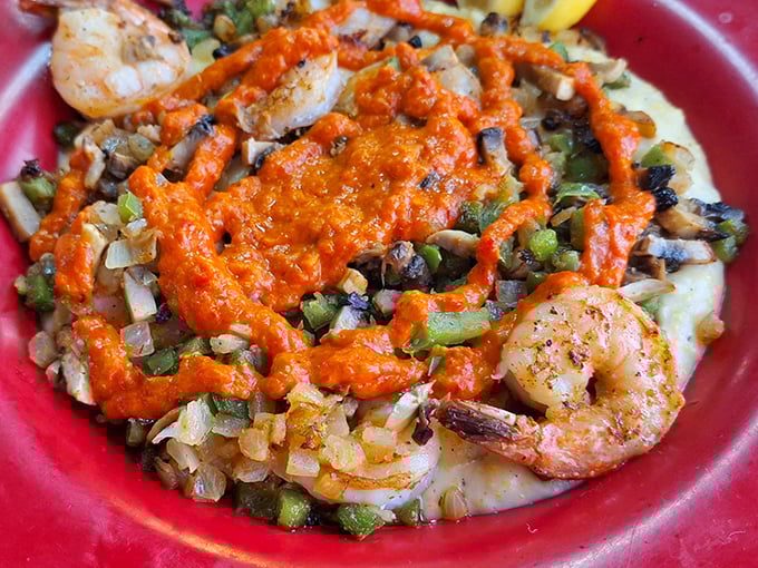 Shrimp and grits get the royal treatment here, swimming in a sauce that's pure Southern comfort.