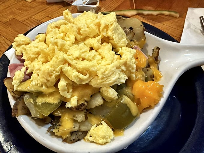 This skillet scramble isn't just breakfast—it's a treasure hunt where every forkful reveals new delights hiding beneath those fluffy eggs.