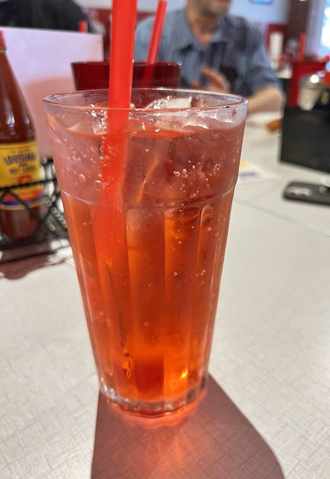 This isn't just a soda—it's liquid nostalgia in a tall glass, fizzing with memories and served with two straws in case you're feeling romantic.