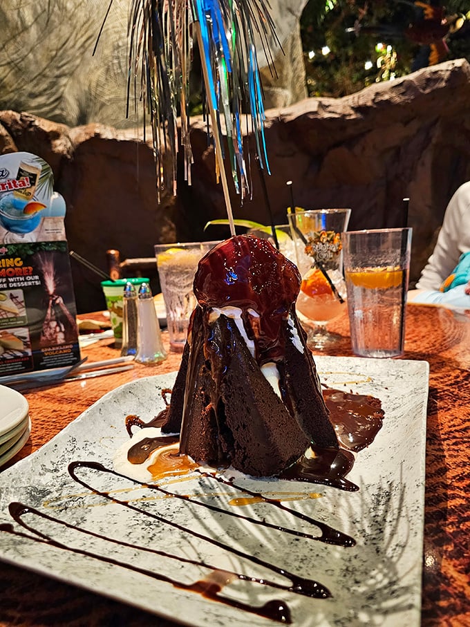 The Sparkling Volcano dessert erupts with chocolate decadence – a brownie mountain topped with ice cream "lava" that would make geologists drool.