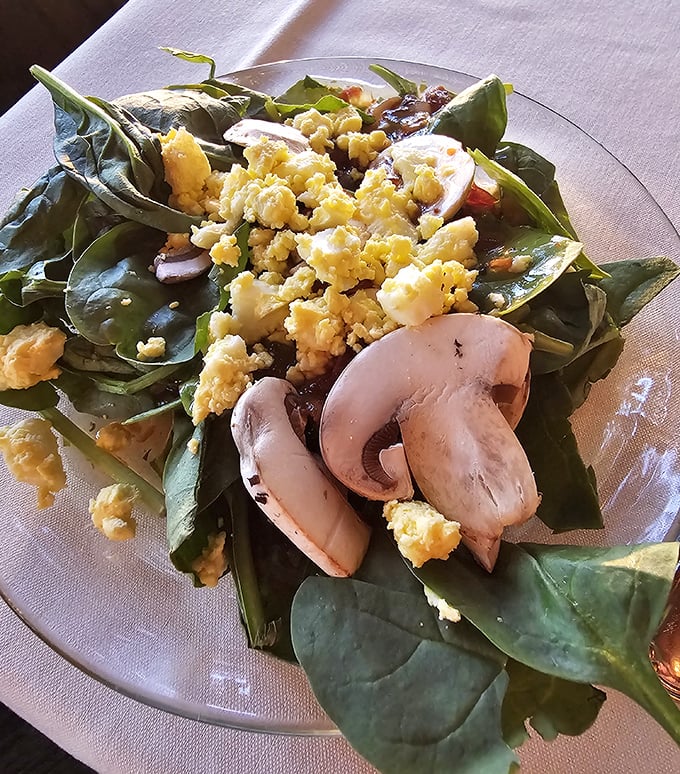 A spinach salad that makes you question everything you thought you knew about salads – those mushrooms didn't come to play.