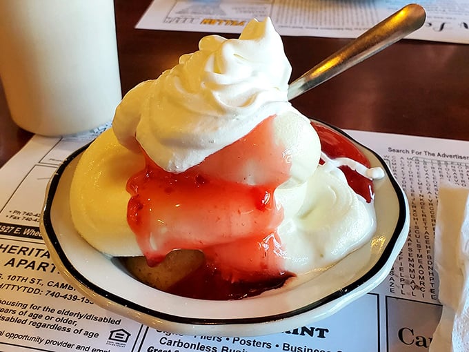 Strawberry shortcake that doesn't need a filter—just sweet berries nestled in clouds of whipped cream atop a golden base.