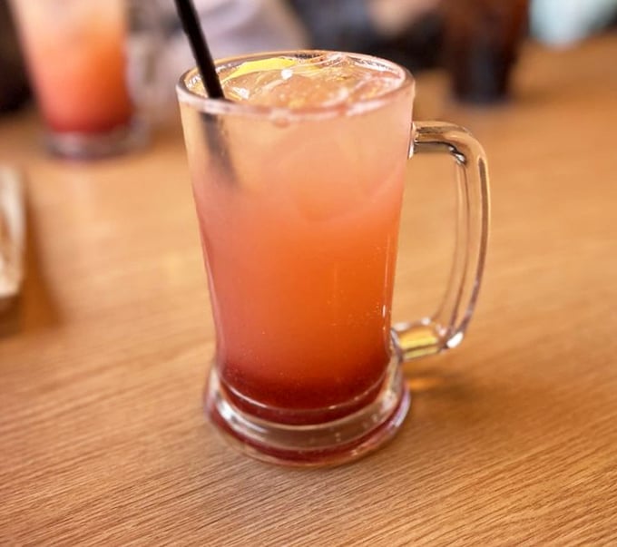 A strawberry lemonade that glows like a California sunset in a mug—tart, sweet, and refreshing enough to make you forget about wine country.