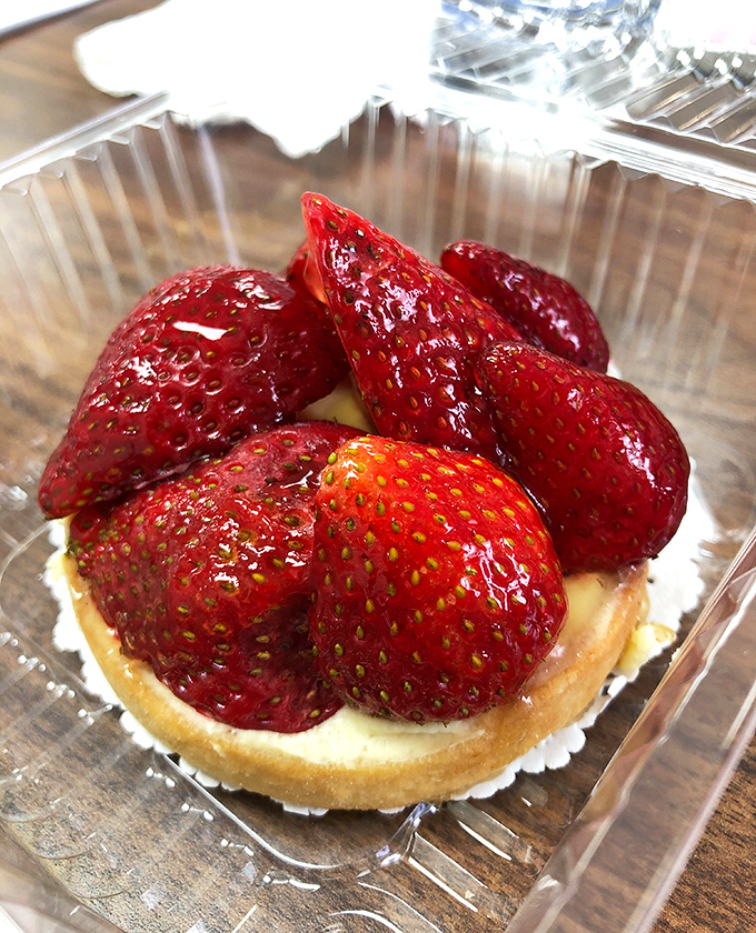 This strawberry tart is summer captured in a pastry shell. Those berries aren't just fruit—they're rubies crowning a treasure of sweet custard.