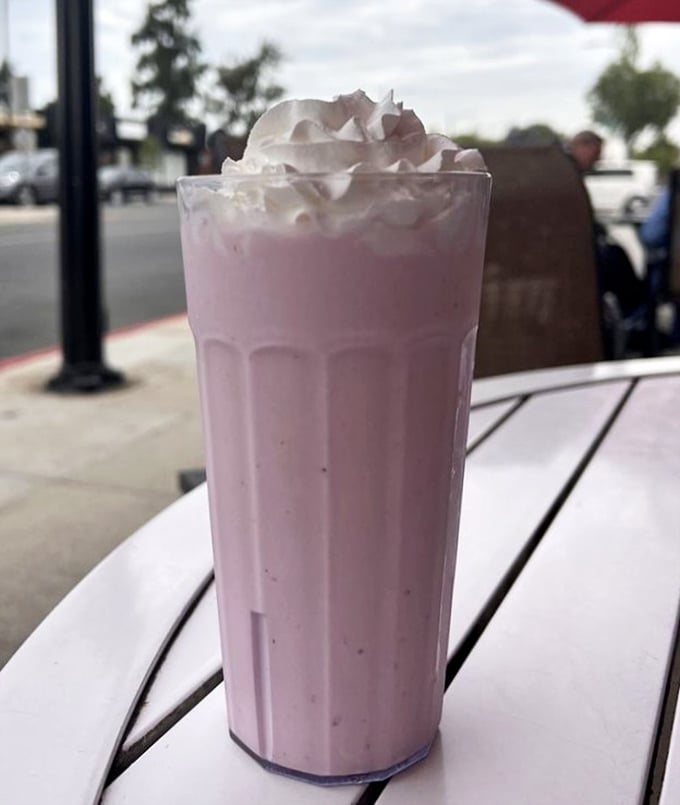 A strawberry shake so thick you'll get an arm workout with your dessert. Pink perfection topped with a cloud of whipped cream.