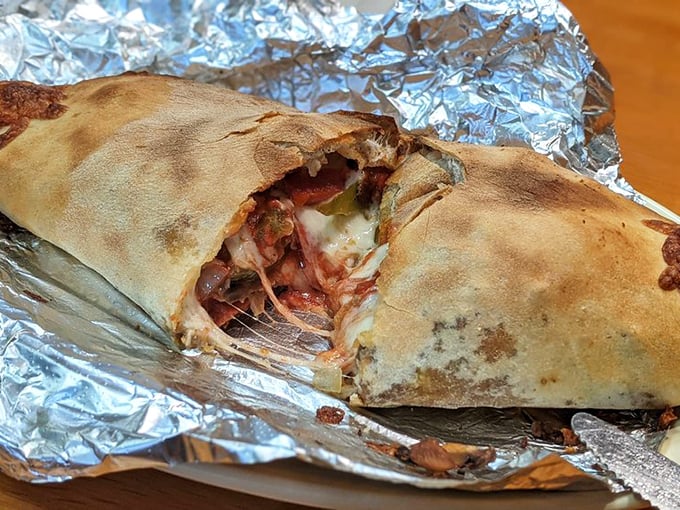 Wrapped tighter than a secret and twice as satisfying – this stromboli means serious comfort food business.
