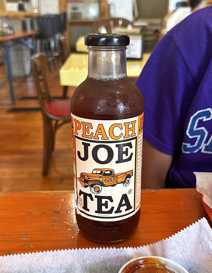 Peach tea in a bottle—because sometimes the perfect sidekick to smoky meat is something sweet that reminds you of summer porches and lazy afternoons.
