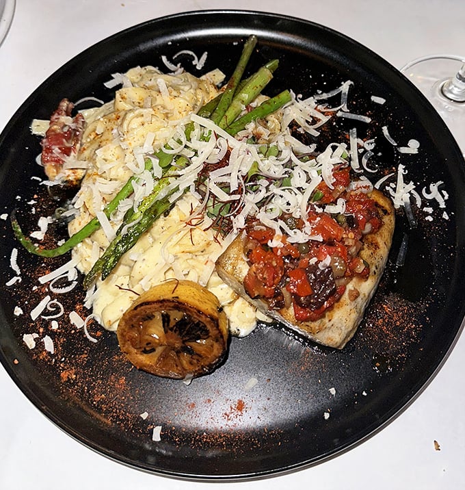 This isn't just fish—it's swordfish elevated to art form, perfectly seared and plated with the confidence of a chef who knows exactly what they're doing. 