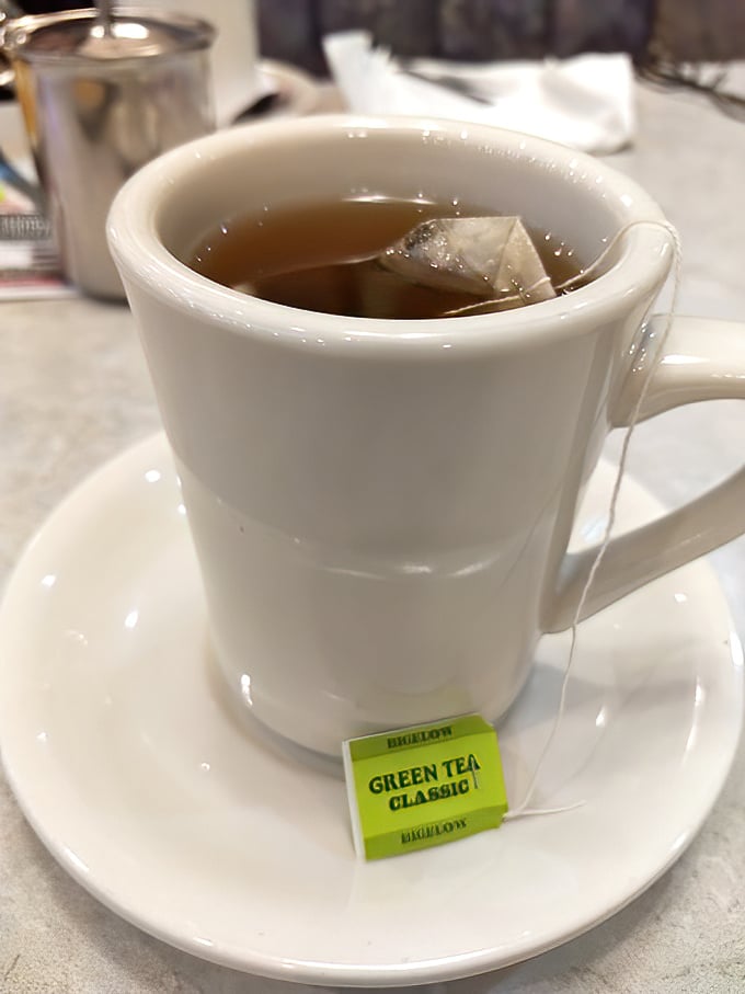 Even the tea service gets respect here—a proper cup and saucer that makes you feel civilized even if you're still wearing yesterday's sweatpants.