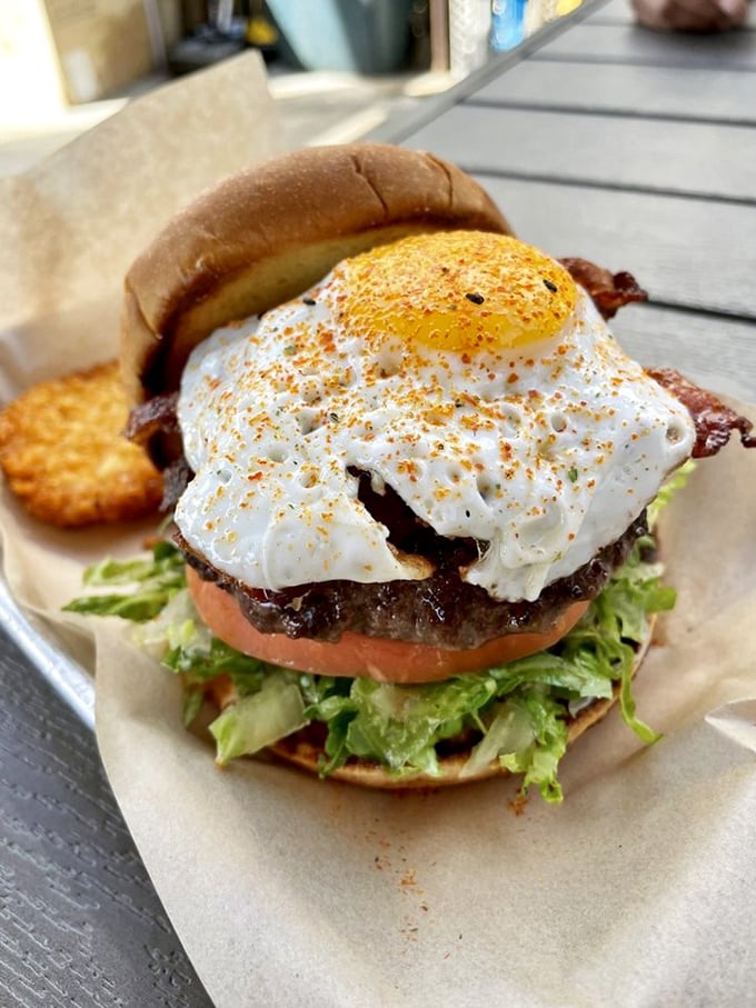 This burger doesn't just come with an egg on top – it arrives with one that's been perfectly cooked by the breakfast gods themselves.