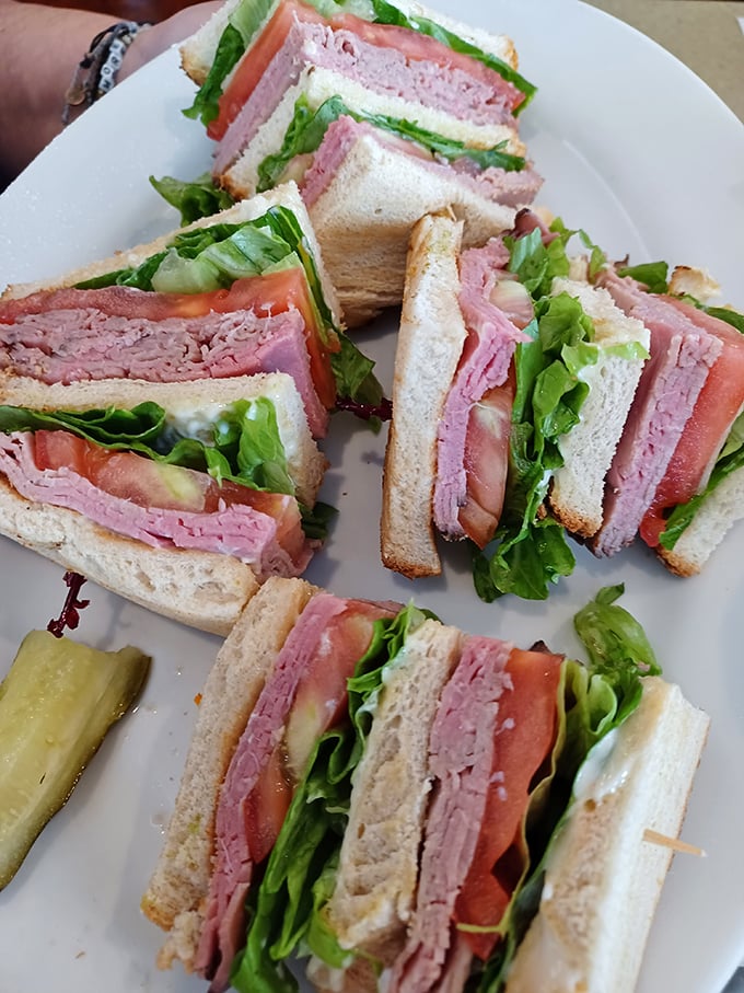 The club sandwich – architecture's greatest contribution to lunch. These perfectly stacked layers deserve their own blueprint and building permit.
