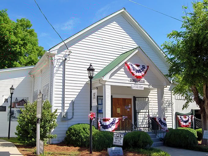 White clapboard, patriotic bunting, and small-town charm – the Granville Museum preserves stories that would otherwise fade like old photographs.