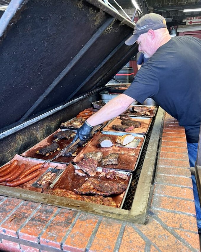 The pit—where magic happens and meat transforms from ordinary to extraordinary under the watchful eye of smoke masters.