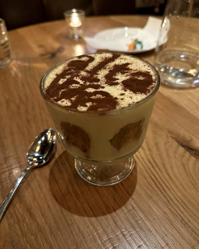 Not your nonna's tiramisu, but she'd approve—velvety mascarpone, coffee-soaked goodness, and chocolate dusting in perfect proportion.