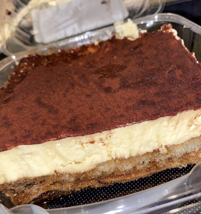 That tiramisu isn't just dessert—it's therapy in a container, with layers of coffee-soaked comfort that costs less than fifteen minutes with a therapist.