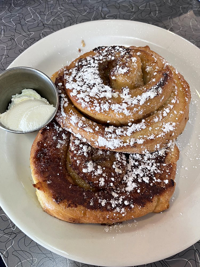 This cinnamon roll French toast didn't just break the breakfast rules—it rewrote them, then dusted the evidence with powdered sugar.