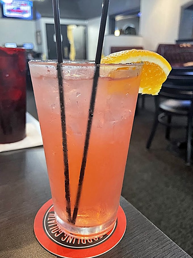 Even the cocktails dress to impress—this refreshing citrus concoction is sunshine in a glass, complete with a proper orange garnish.