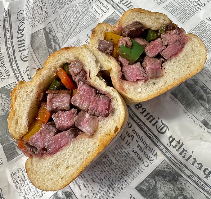 The Wagyu steak sandwich – where beef so marbled and tender meets fresh vegetables in a sesame-studded roll that deserves its own ZIP code.