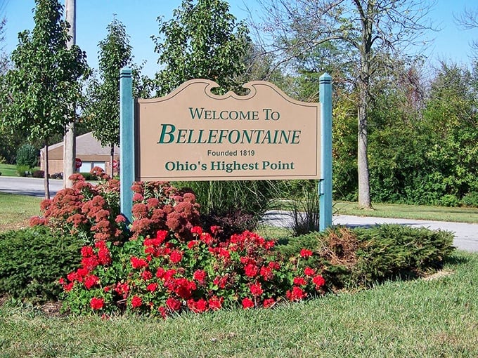 Ohio's Highest Point proclaims the welcome sign, surrounded by flowers that seem to be saying, "altitude isn't the only thing that's high-quality around here."