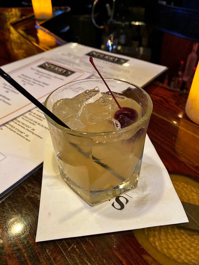 A properly made whiskey sour at Sperry's—where bartenders understand that cocktails, like relationships, require perfect balance and a little zest.