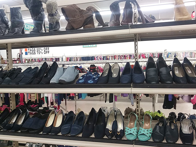 Shoe shelves stacked like a Payless that won the lottery and decided to share.