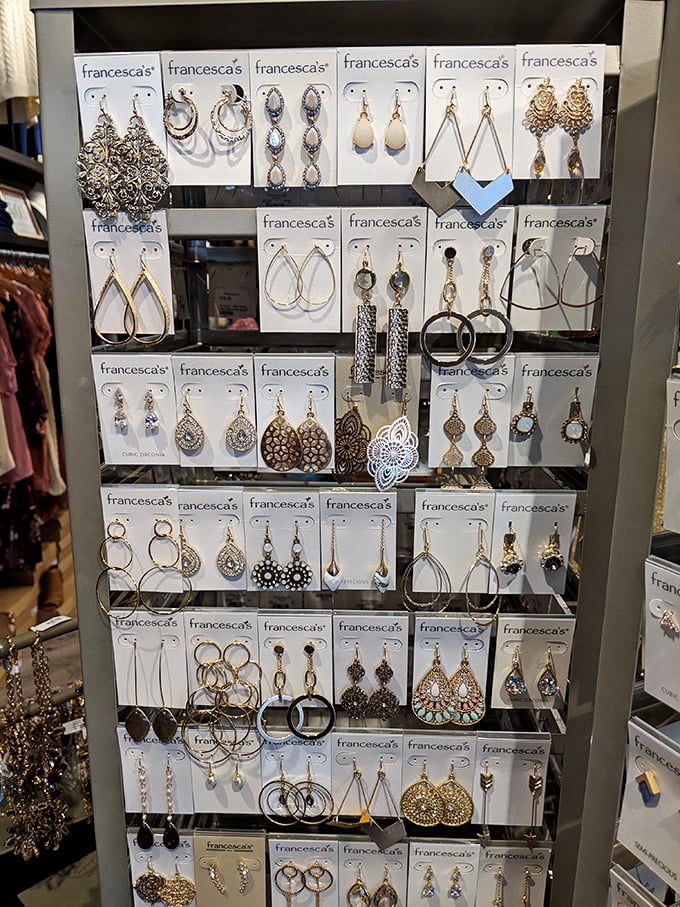 Francesca's accessories display—where earrings multiply like rabbits and your $45 can transform into a jewelry collection worthy of admiration.