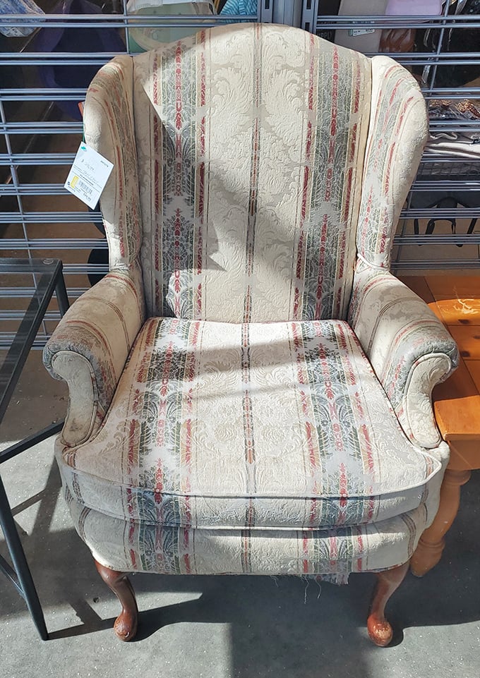 That wingback chair isn't just furniture—it's a time machine to Grandma's living room, complete with vintage upholstery charm.