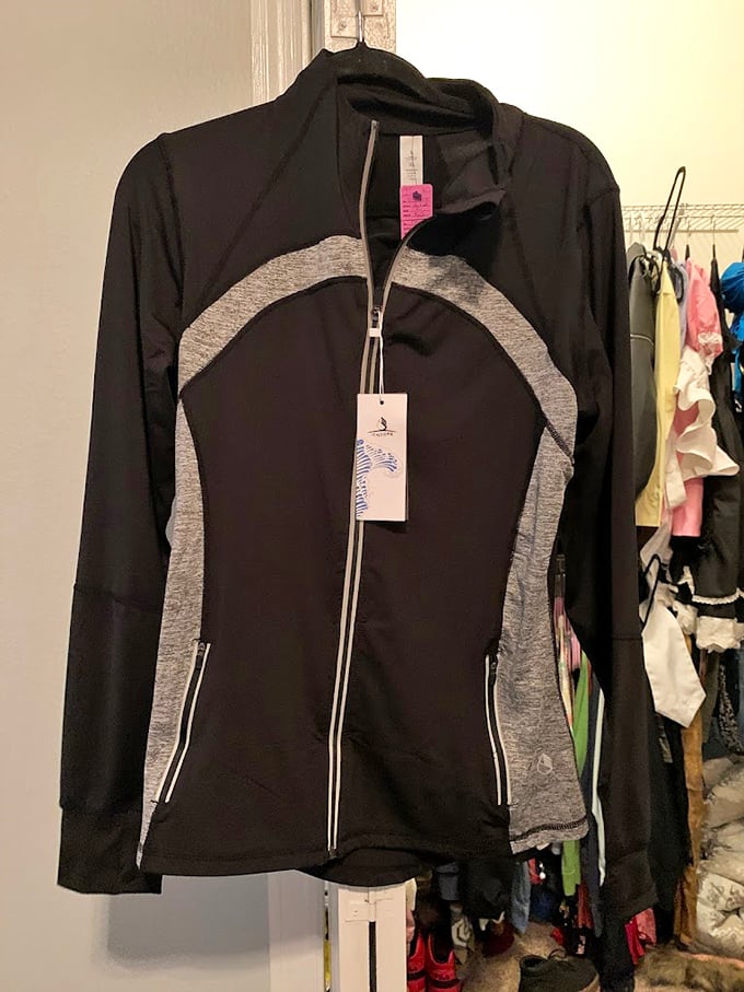 Brand new with tags – the thrift store equivalent of finding a unicorn! This athletic jacket probably retailed for five times what you'll pay here.