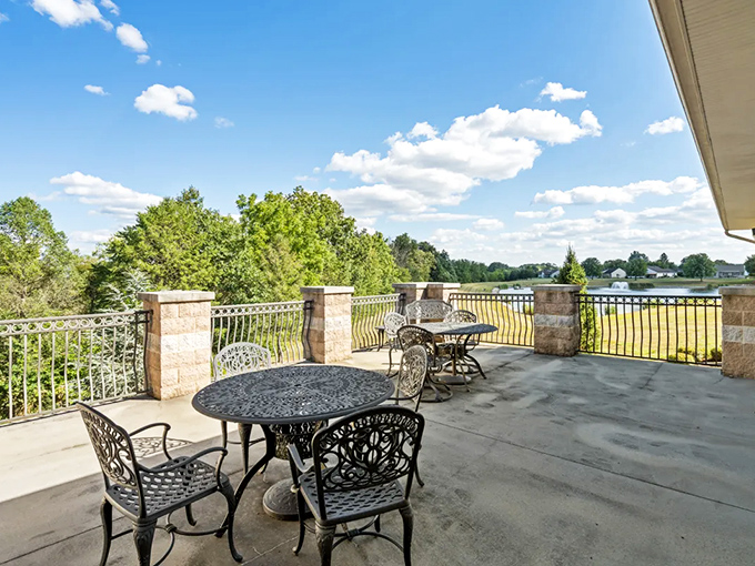 Outdoor seating with a view that makes smartphone scrolling seem ridiculous. These wrought-iron chairs have supported more meaningful conversations than most therapists' couches.