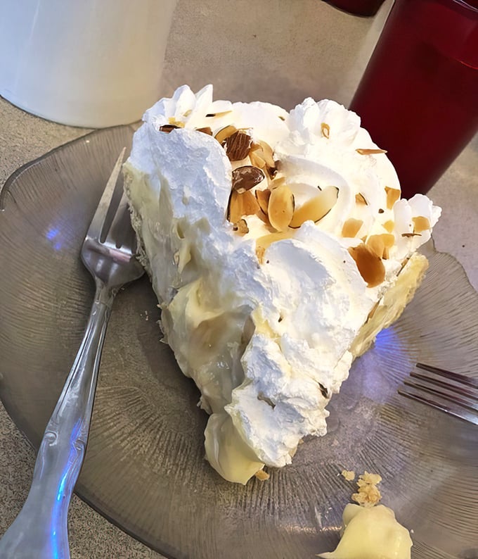 This isn't just pie – it's a cloud of meringue floating atop banana pudding perfection that makes you question why you ever waste calories on lesser desserts.
